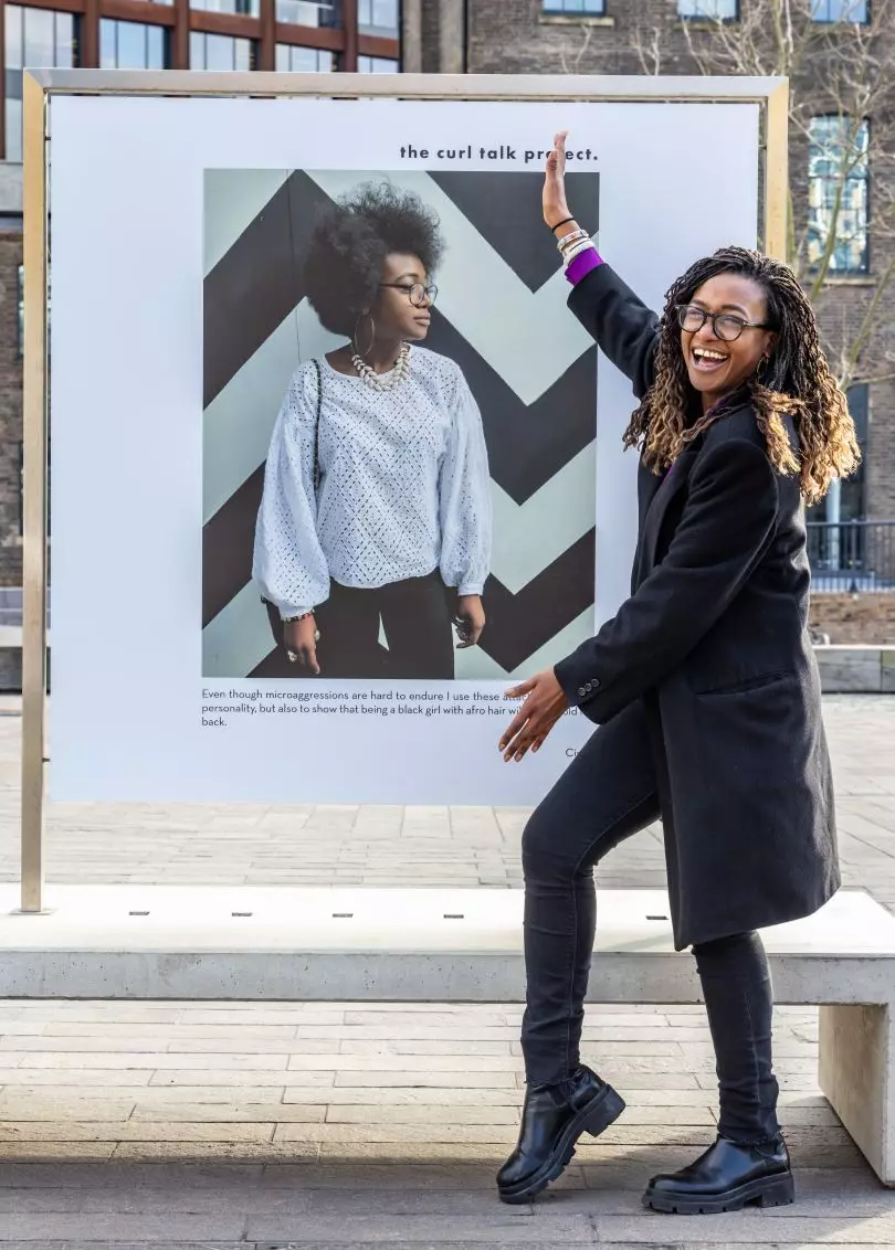 Cindy, one of the women to be featured in The Curl Talk Project, stood in front of her own portrait